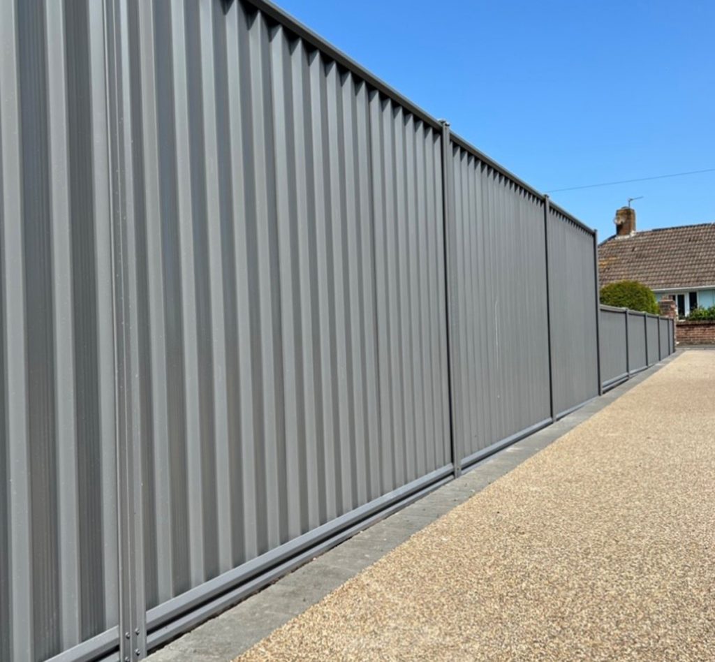 Grey Metal Fence with Flat Caps | ColourFence